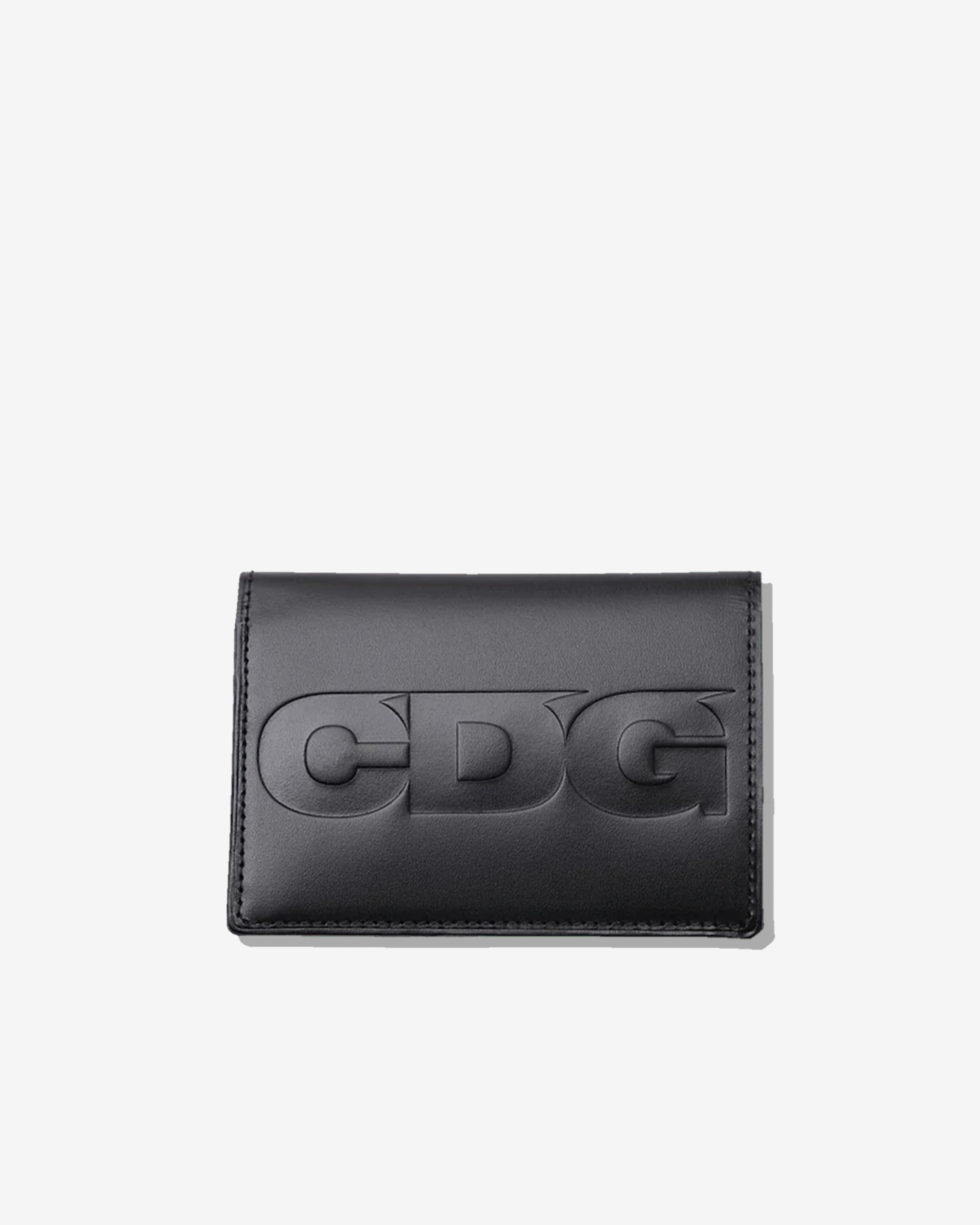 CDG: Embossed Logo Wallet (SA6400 Black) | DSMNY E-SHOP
